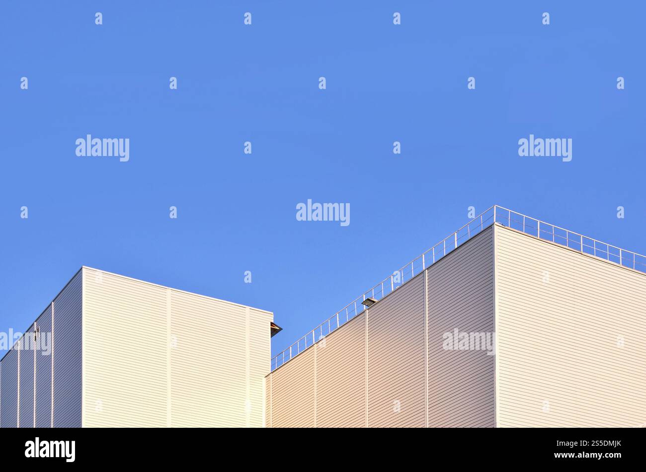 Photo of industrial high-rise building with perfect quality siding in ...