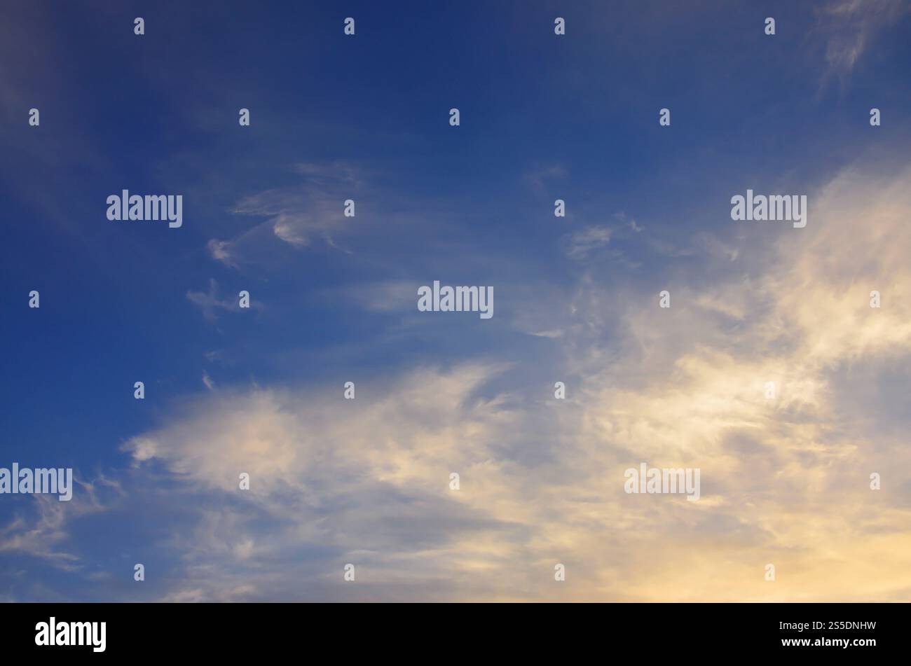 Heavenly space of blue color with a lot of thick white clouds. Background picture of a cloudy ...