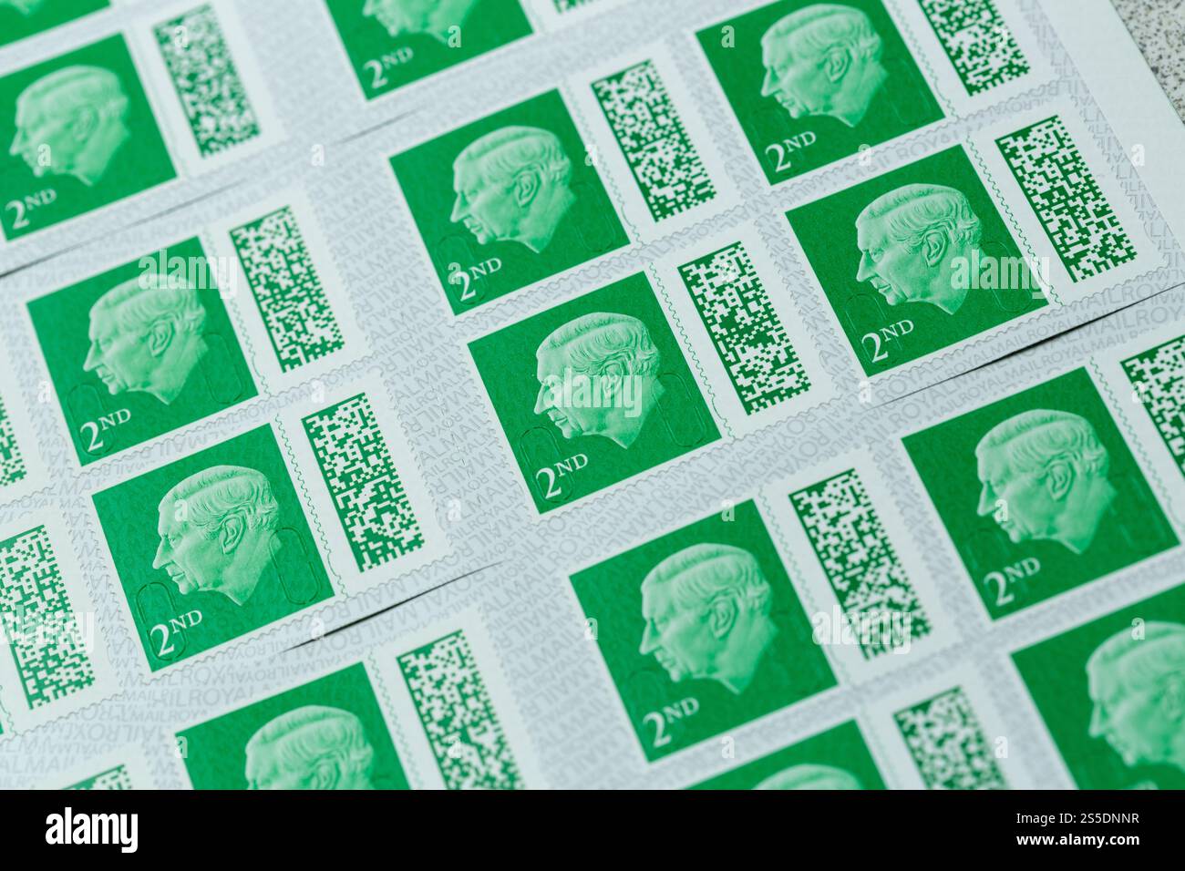 Sheets of second class postage stamps with the head of King Charles the ...