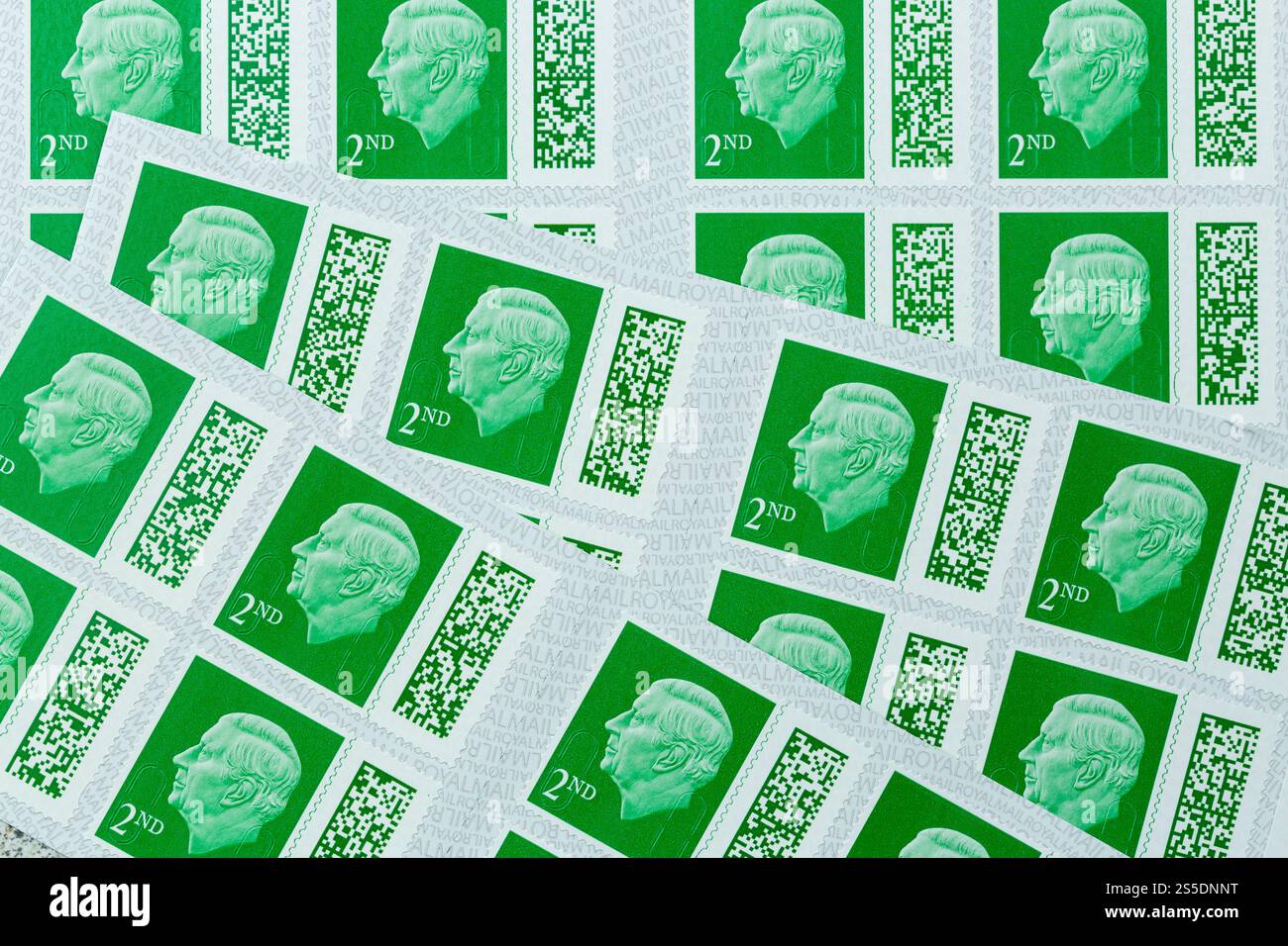 Sheets of second class postage stamps with the head of King Charles the ...