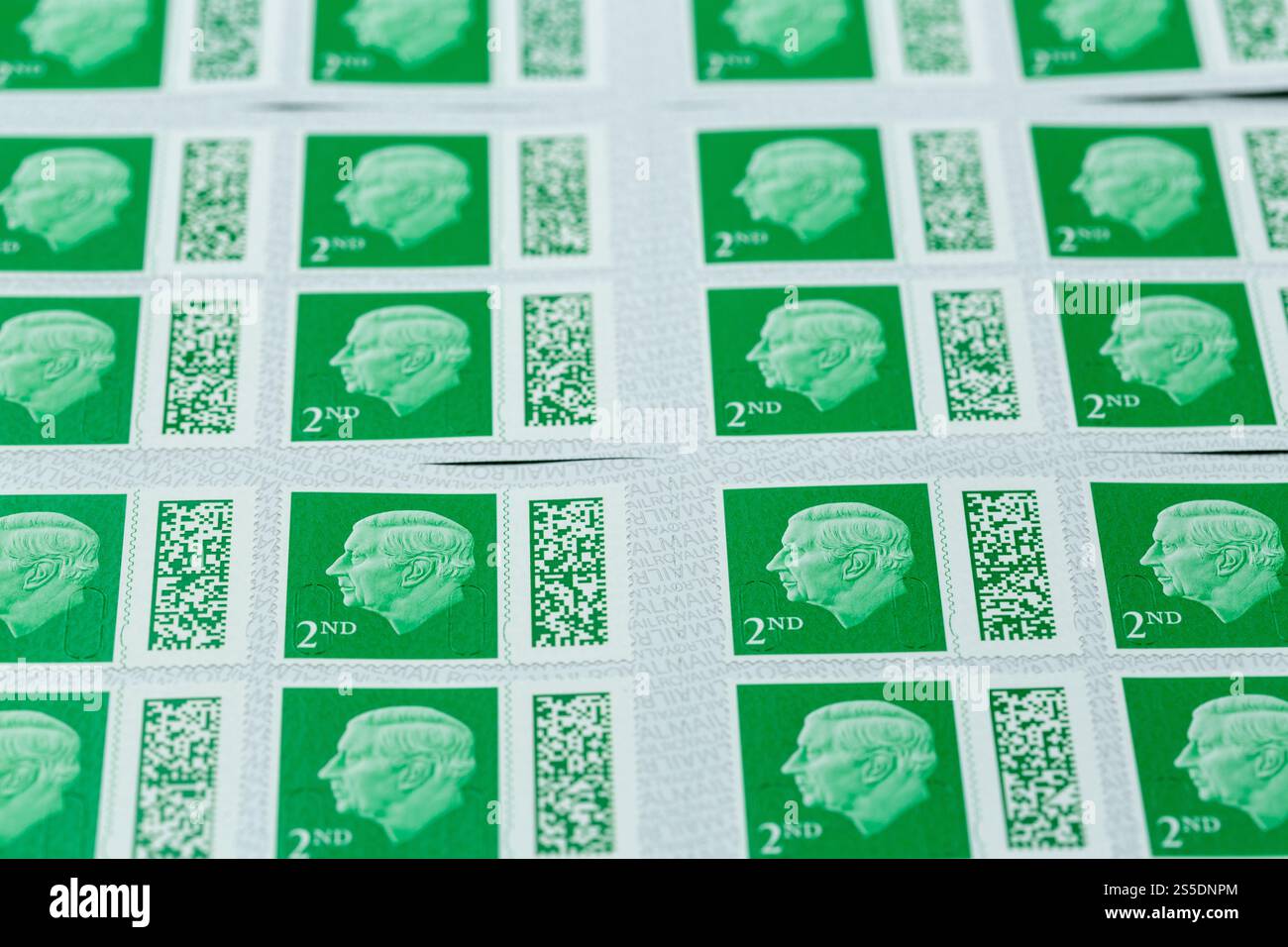 Sheets of second class postage stamps with the head of King Charles the ...