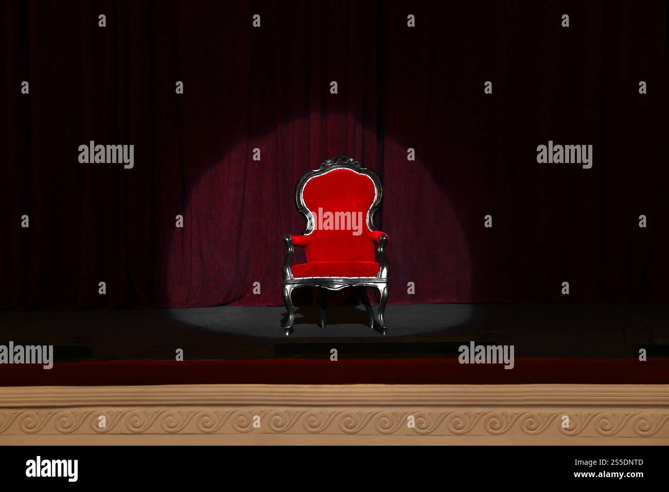 Vintage red armchair on stage in theatre Stock Photo - Alamy