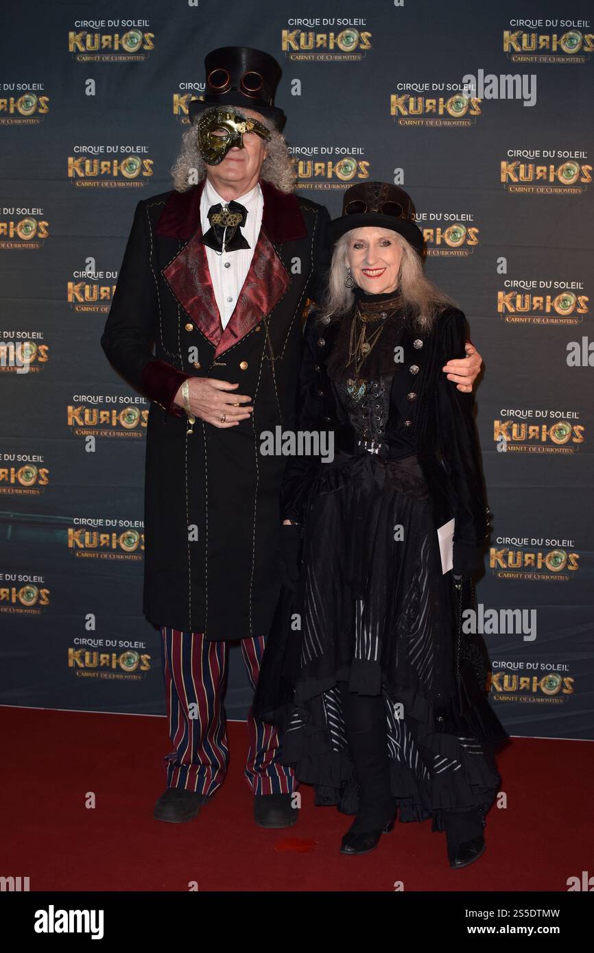 Brian May and Anita Dobson attends the European premiere of Cirque du ...