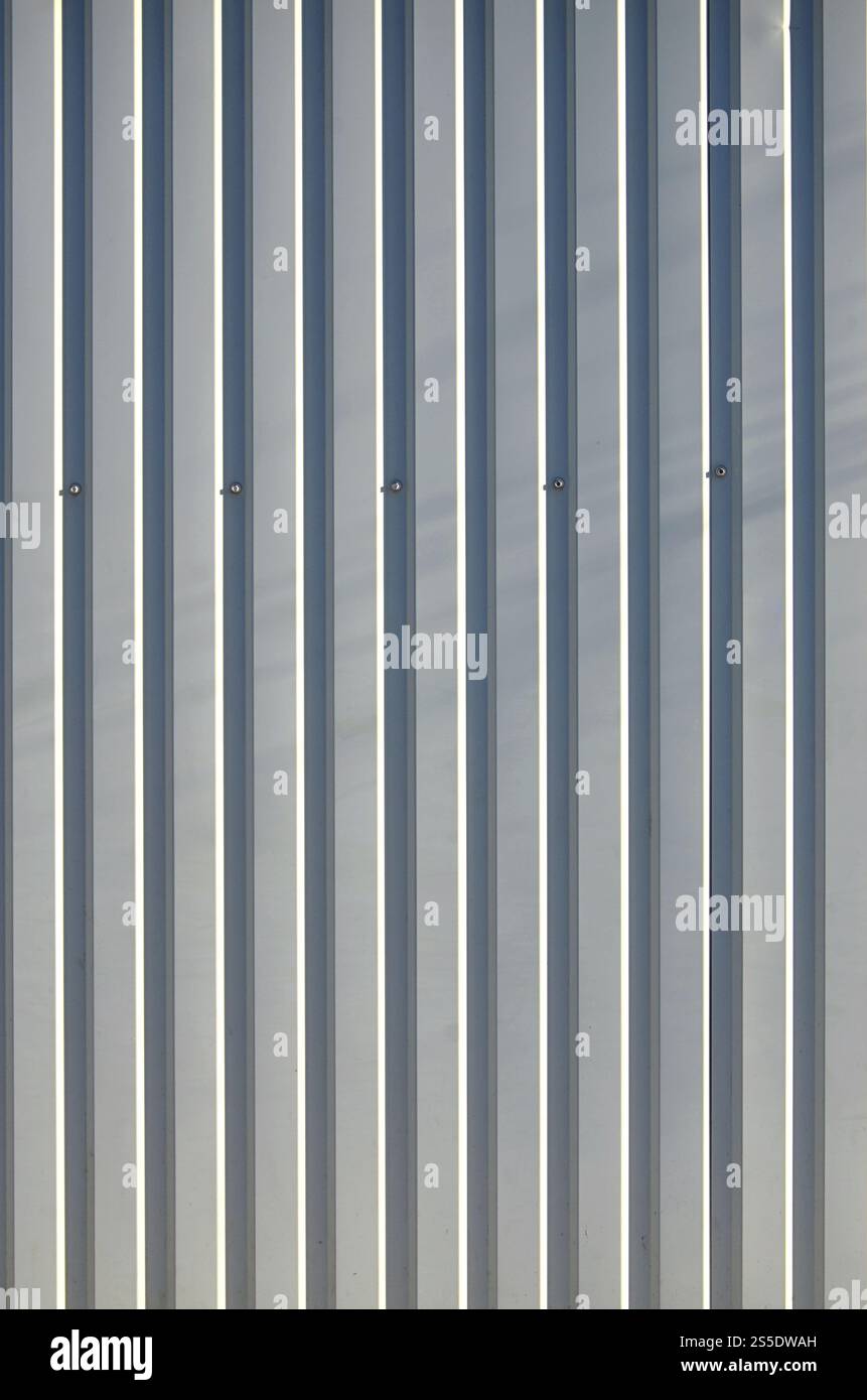 Siding, metal panels texture closeup in the daytime outdoors. Metal ...