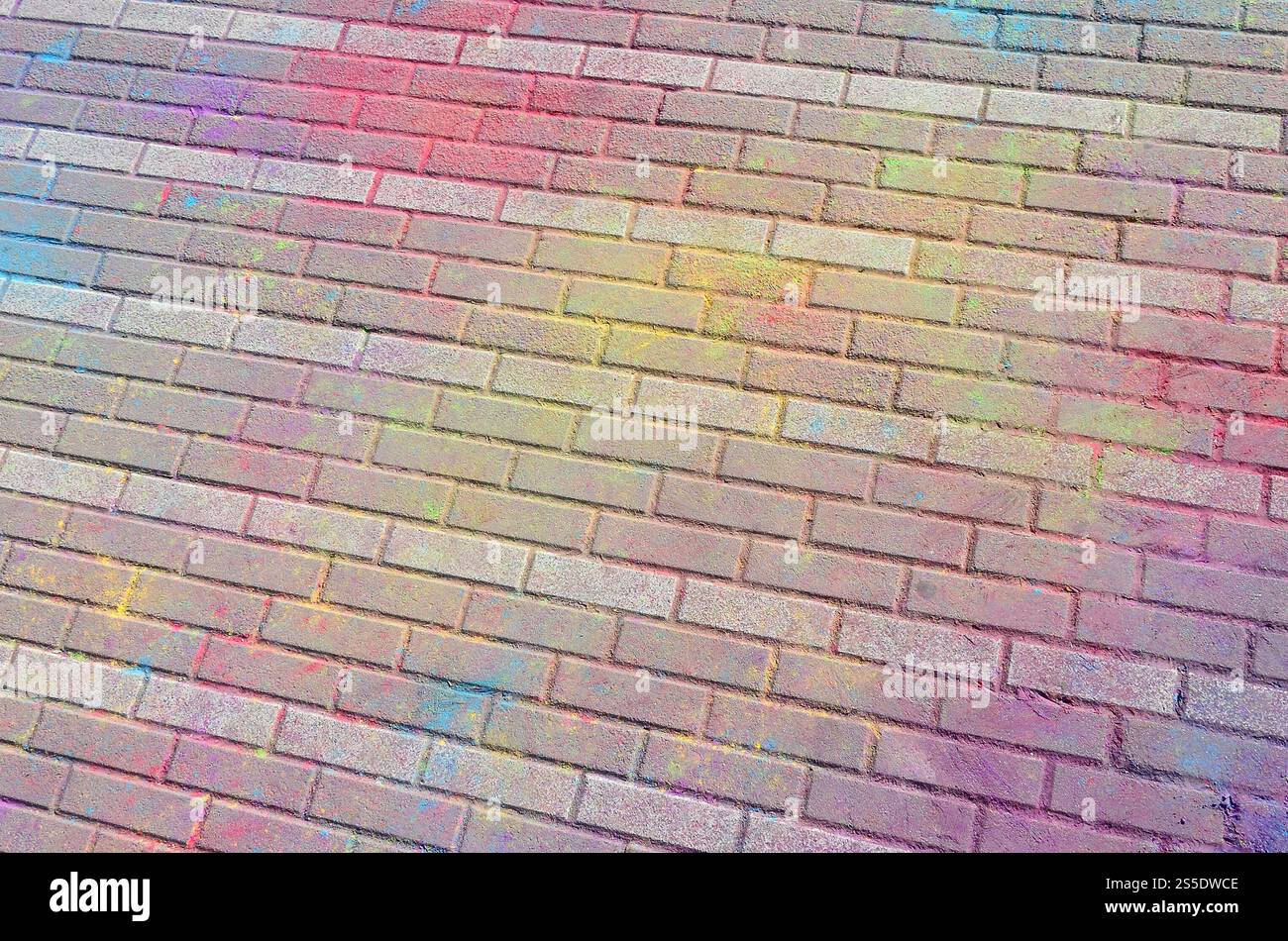Multi colored earth, paving slabs, powder coated with dry colors at the ...