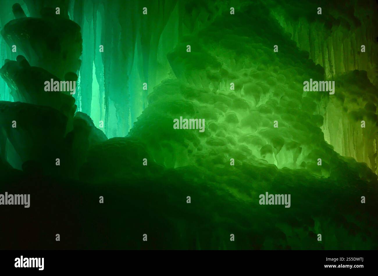 Huge ice icicles. Fragment of large blocks of ice frozen waterfall of ...