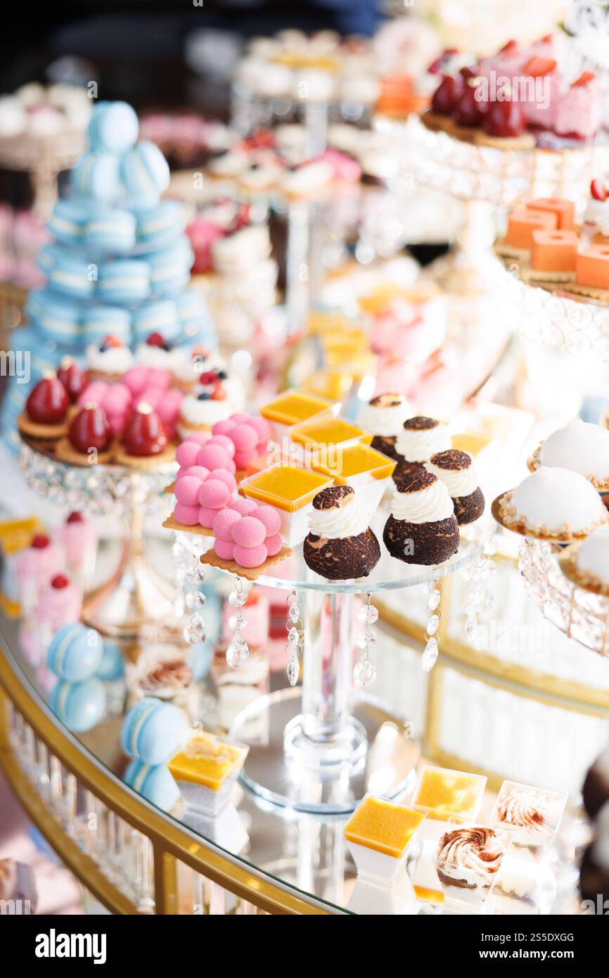Delicious sweets arranged on a table during a party or wedding ...