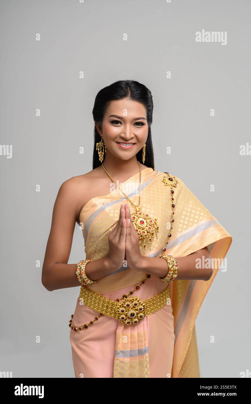 Women wearing Thai clothing that Pay respect,sawasdee symbol Stock ...
