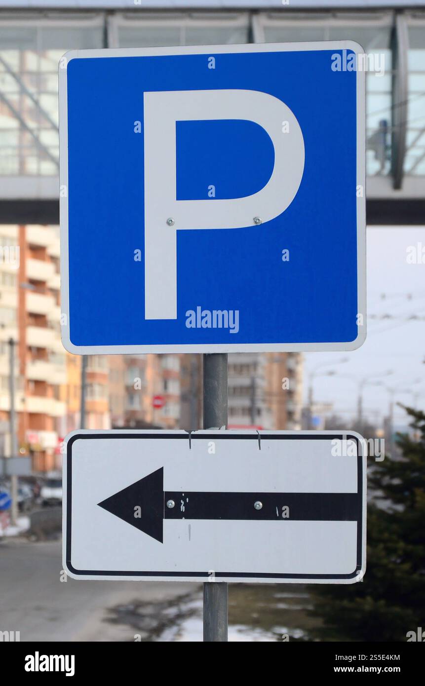 Parking left. Traffic sign with the letter P and the arrows to the left ...