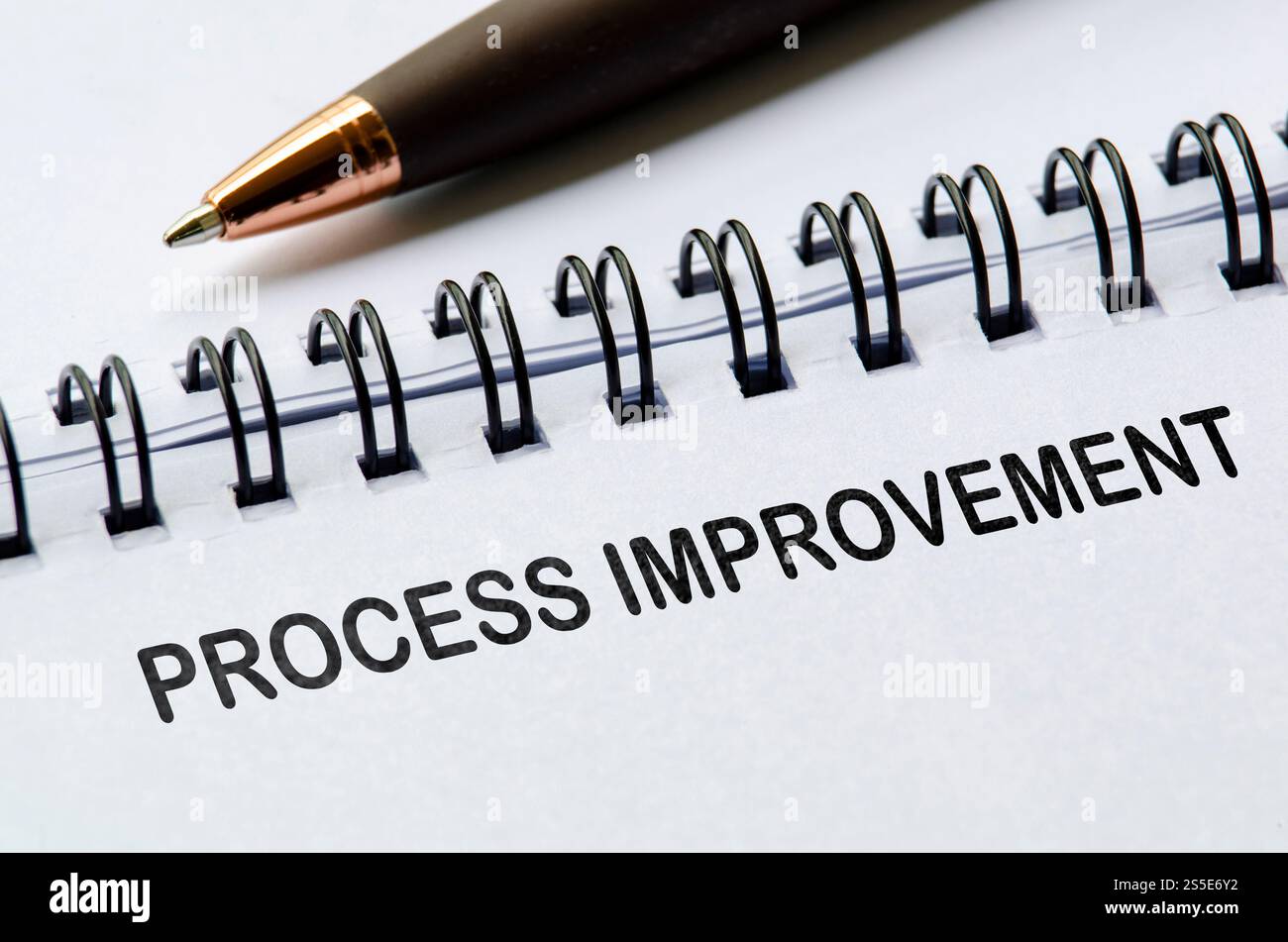 Process Improvement text on white notepad. Business concept Stock Photo ...