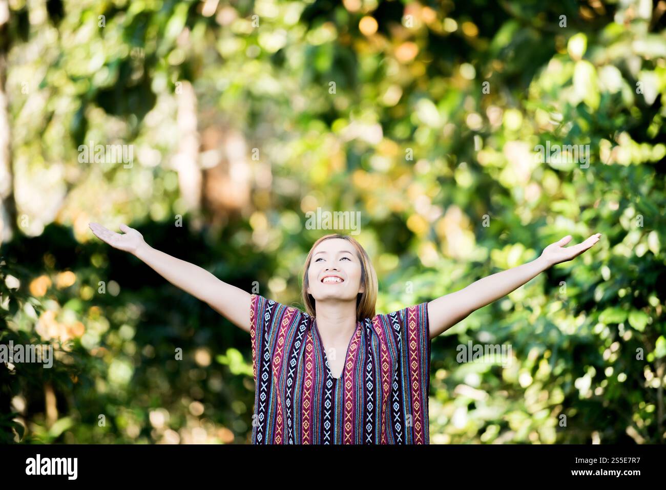 Happy women in nature background Stock Photo - Alamy