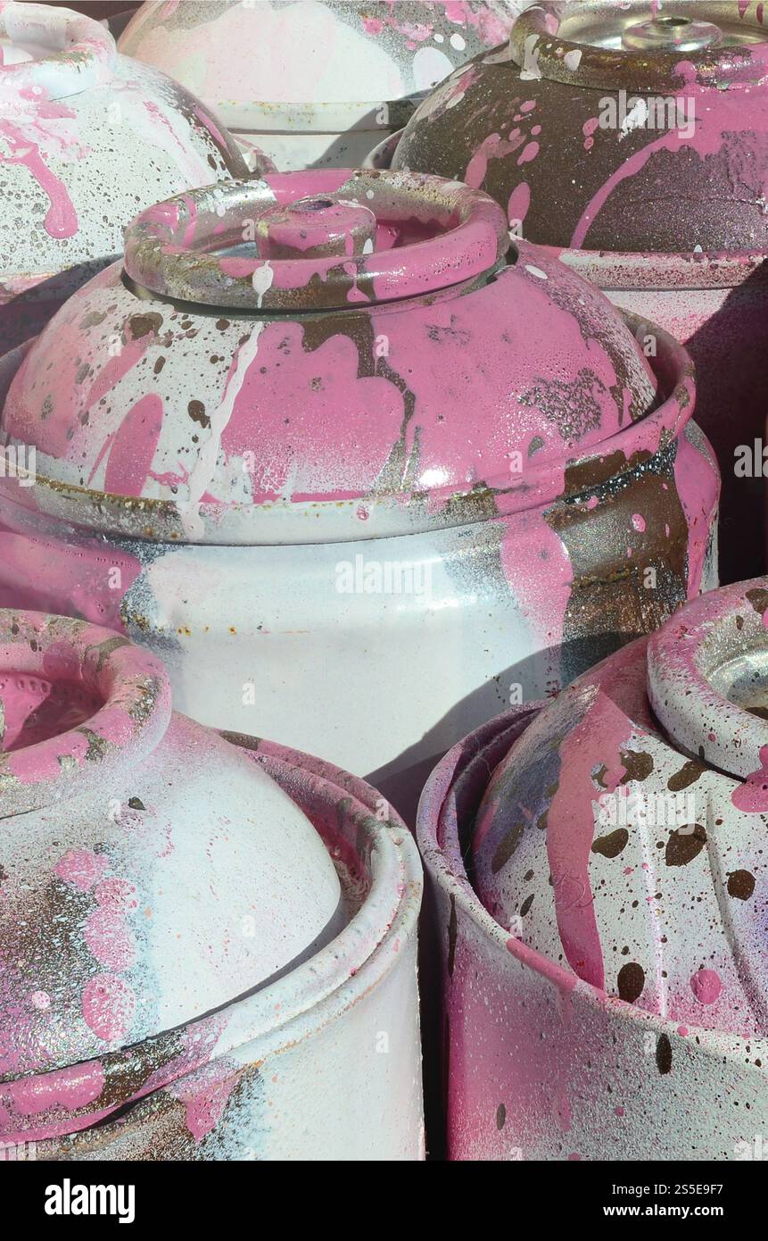 A lot of used pink metal tanks with paint for drawing graffiti Stock ...