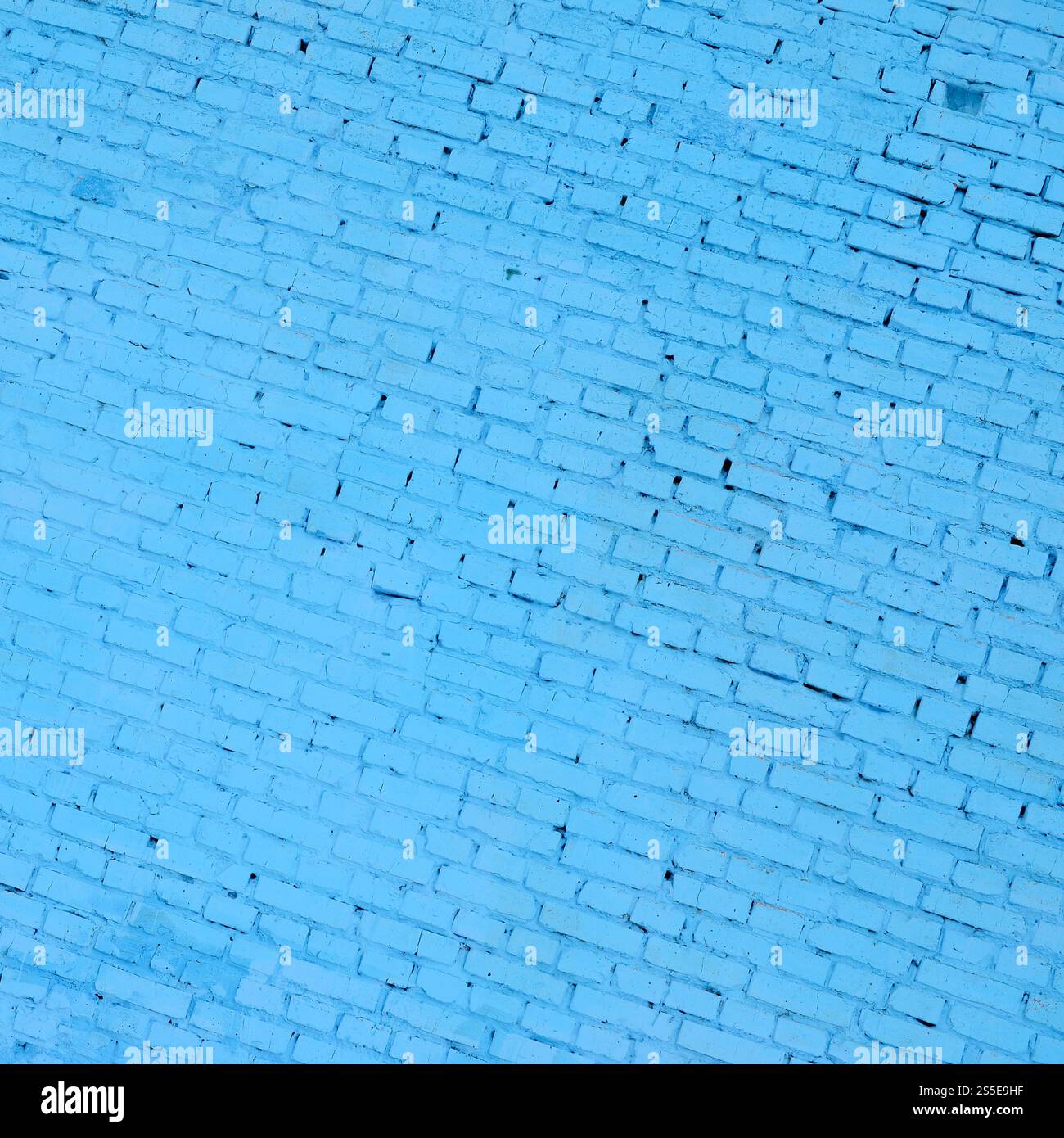 Square brick block wall background and texture. Painted in blue Stock ...