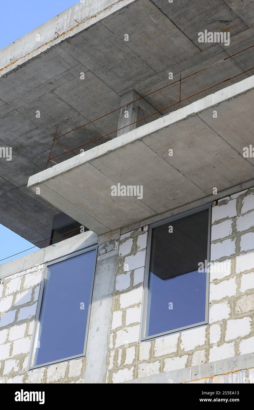 Fragment of an unfinished structure of a multi-storey building made of ...