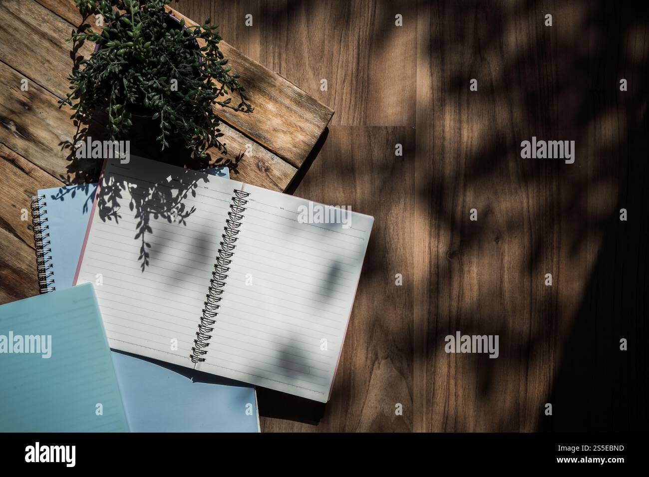 Notebook on top laptop hi-res stock photography and images - Alamy