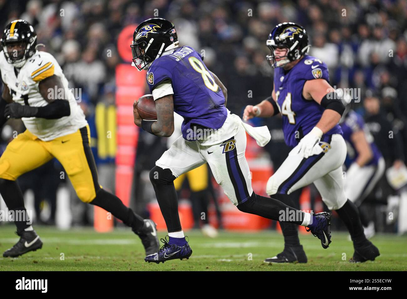 Baltimore Ravens quarterback Lamar Jackson (8) runs the ball during the ...