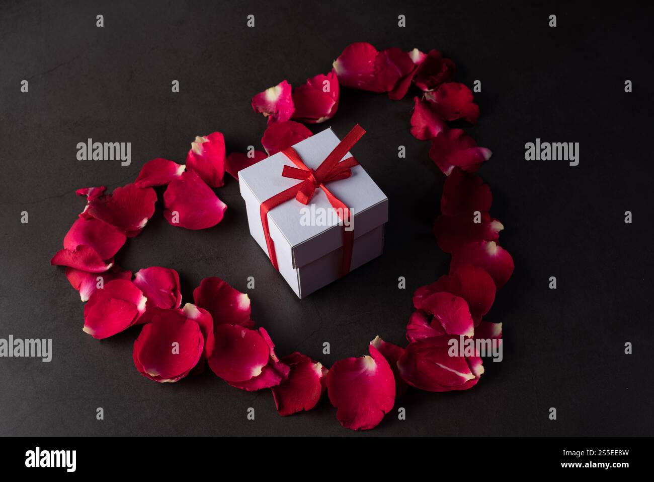 One red rose ribbon hi-res stock photography and images - Alamy