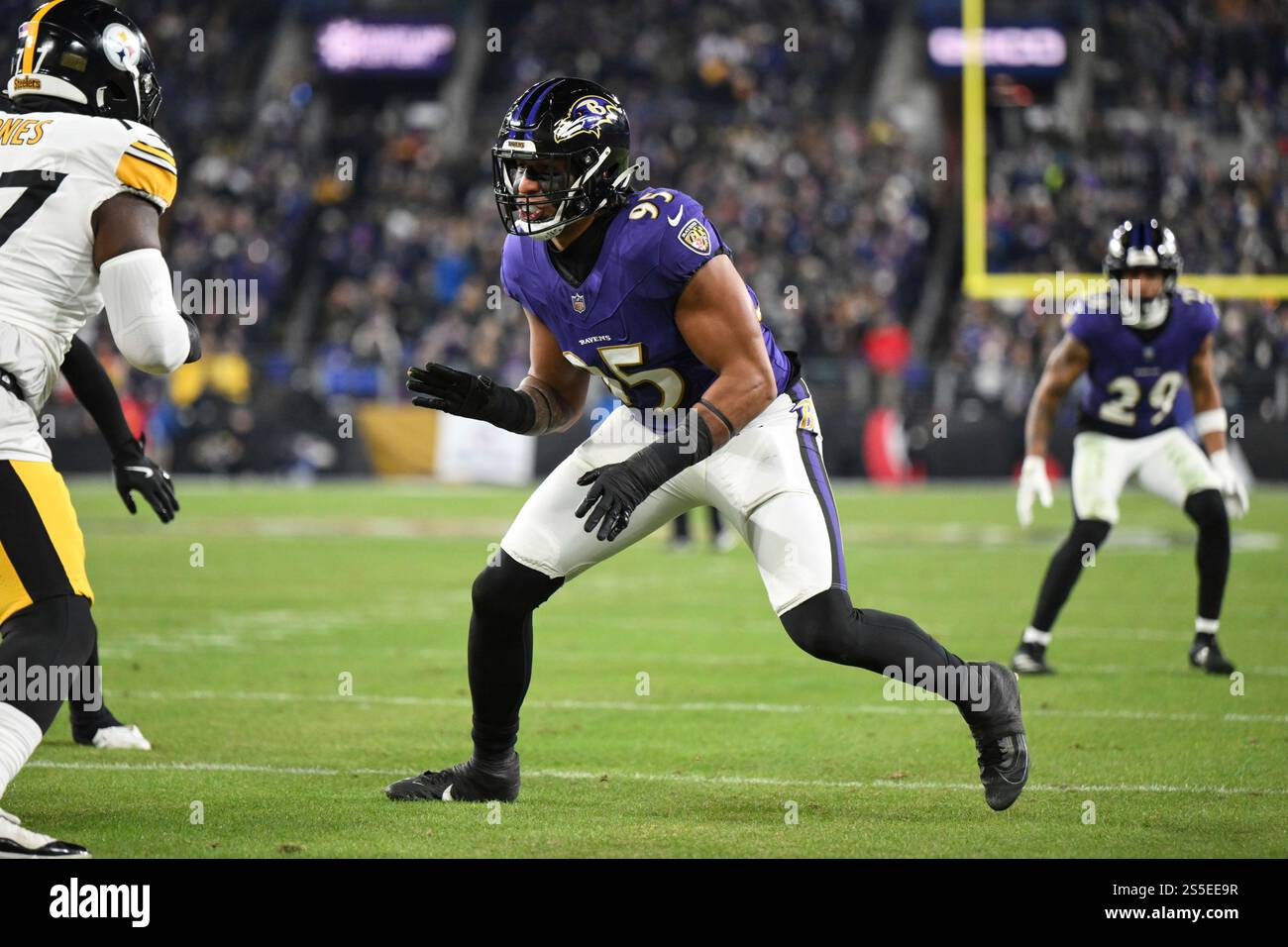Baltimore Ravens linebacker Tavius Robinson (95) in action during the ...