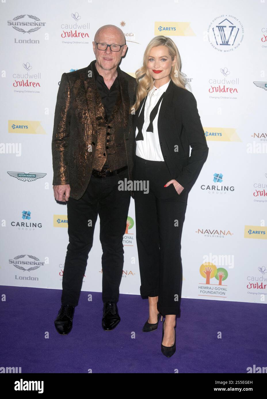 John Caudwell and Laura Whitmore attends the Caudwell Children ...