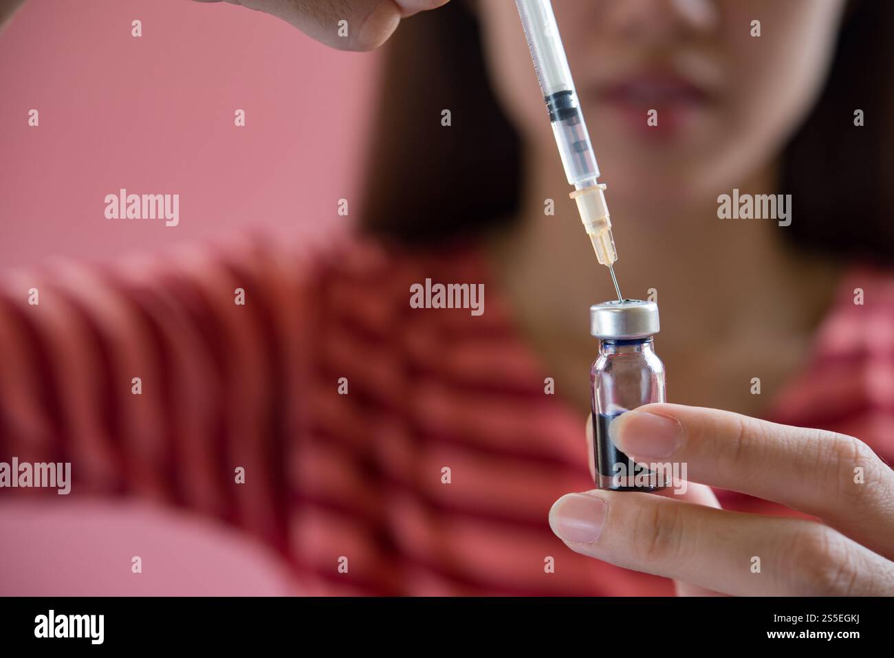 Woman holding vitamins hi-res stock photography and images - Alamy