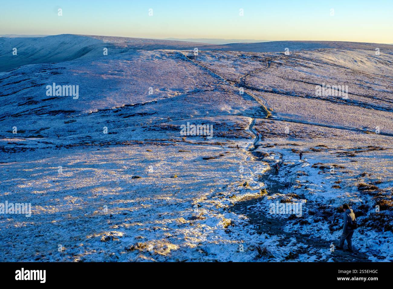 Edale Cross on Kinder Scout in the Peak District with a light cover of ...