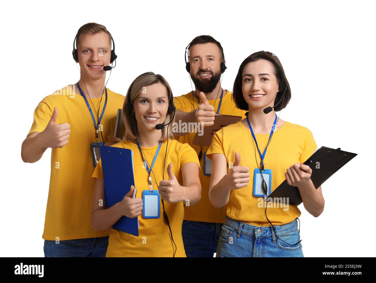 Technical support call center. Team of friendly operators showing ...