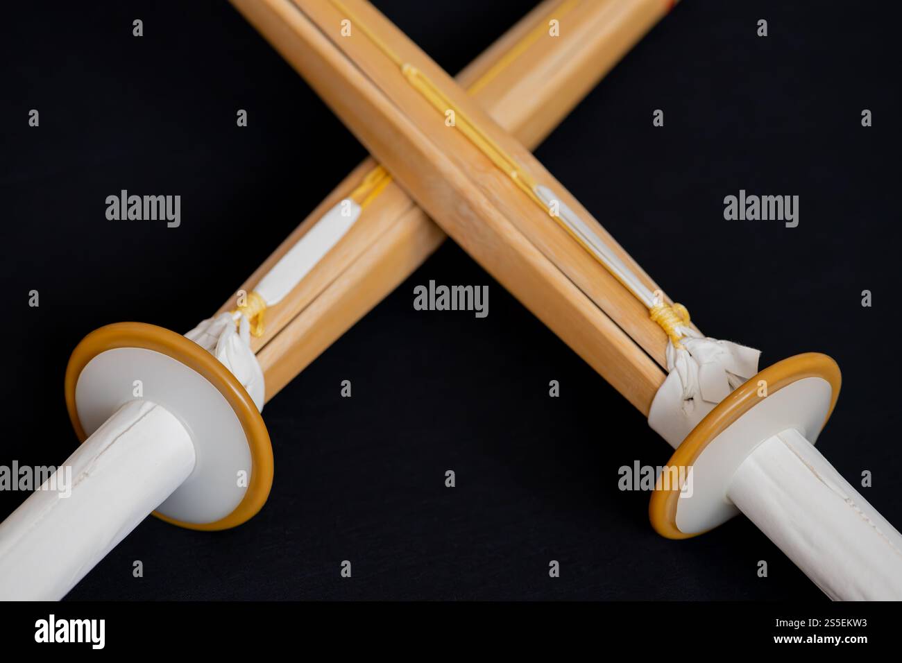 Two crossed shinai for practice and competition in kendo Stock Photo ...