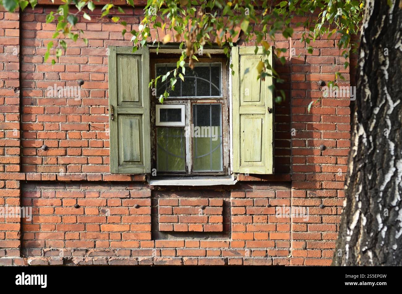 Window of an old Russian colorful village hut. Window of an old Russian ...
