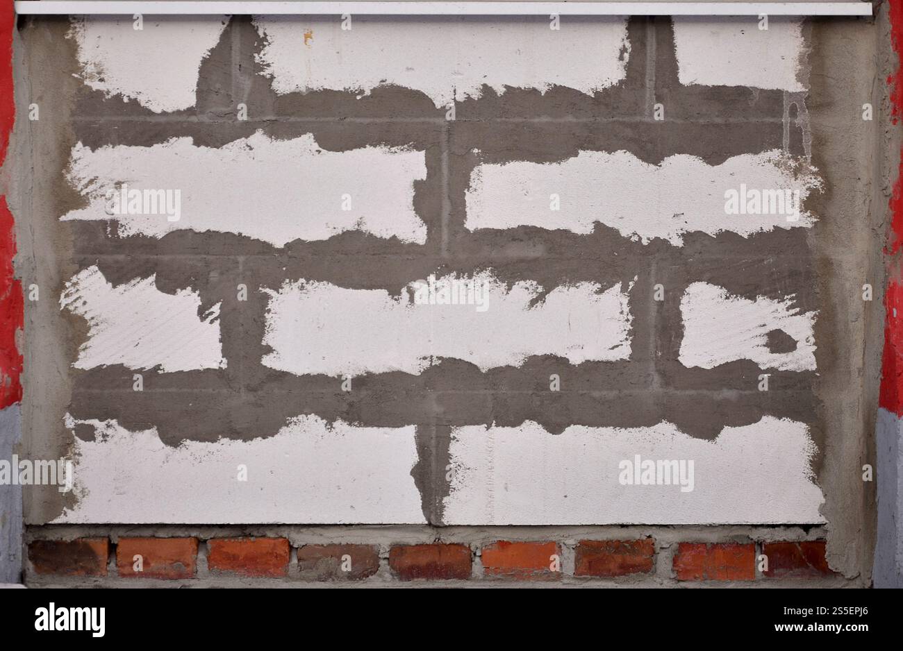 Weathered stained old block wall background close-up. Frame with big ...