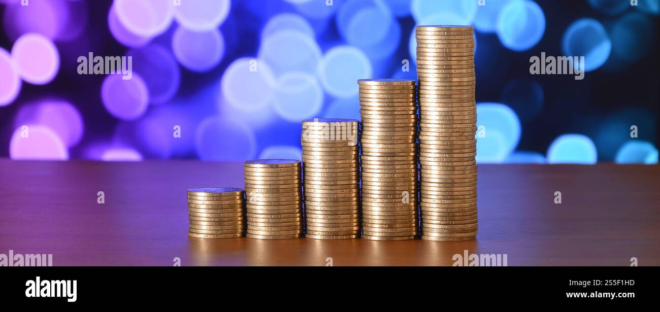 Golden coin stacks arranged as a graph. Increasing columns of coins ...