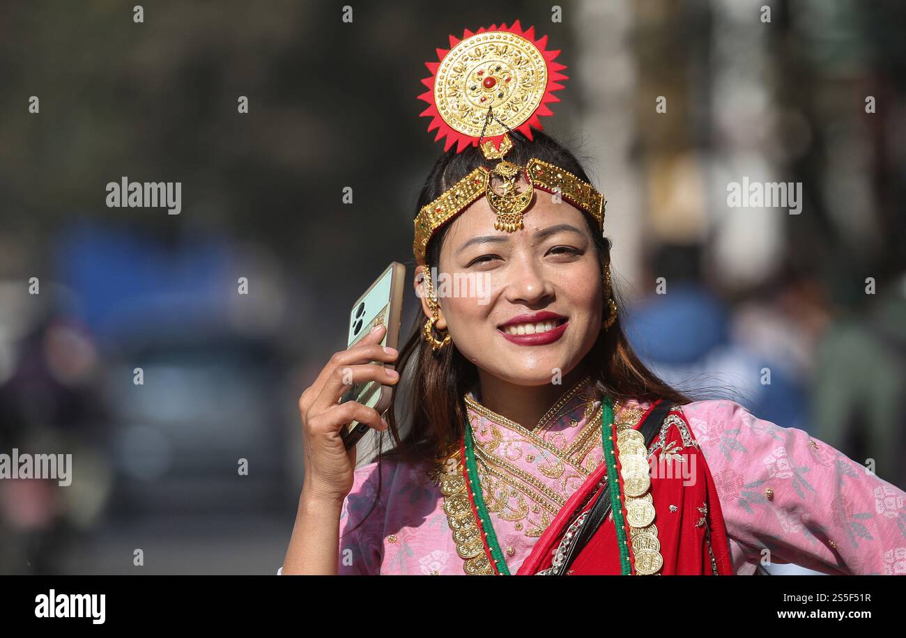 January 14, 2025: A woman from Magar community smiles participating in ...