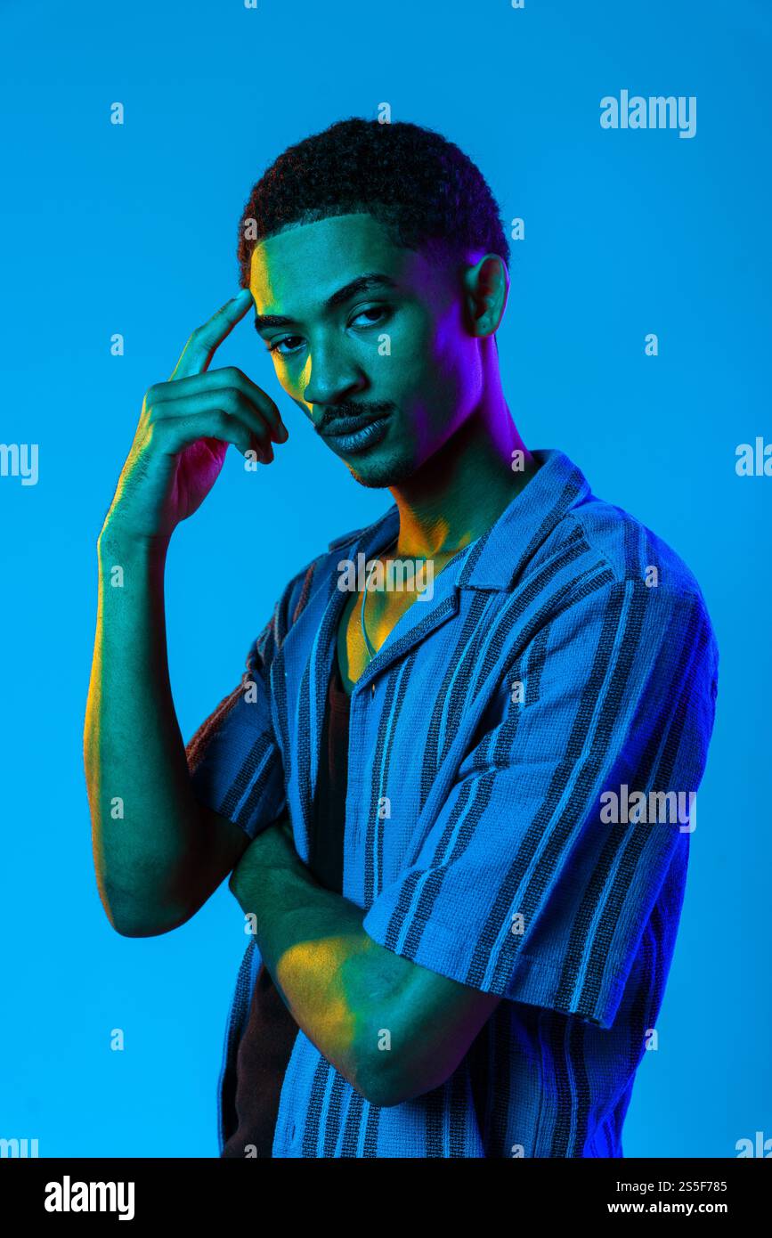 African man young portrait in studio on colorful background - Cool ...