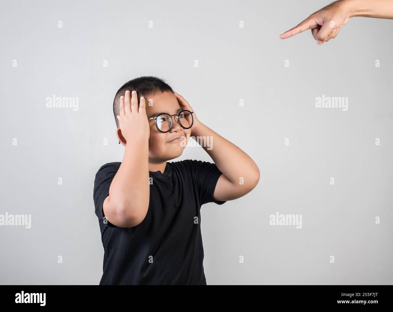 Boy feels sad after the parents scold him Stock Photo - Alamy