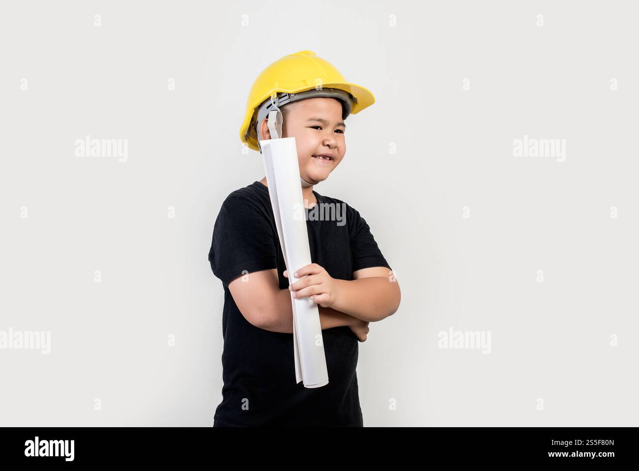 Portrait Happy boy wearing engineer hat Stock Photo - Alamy