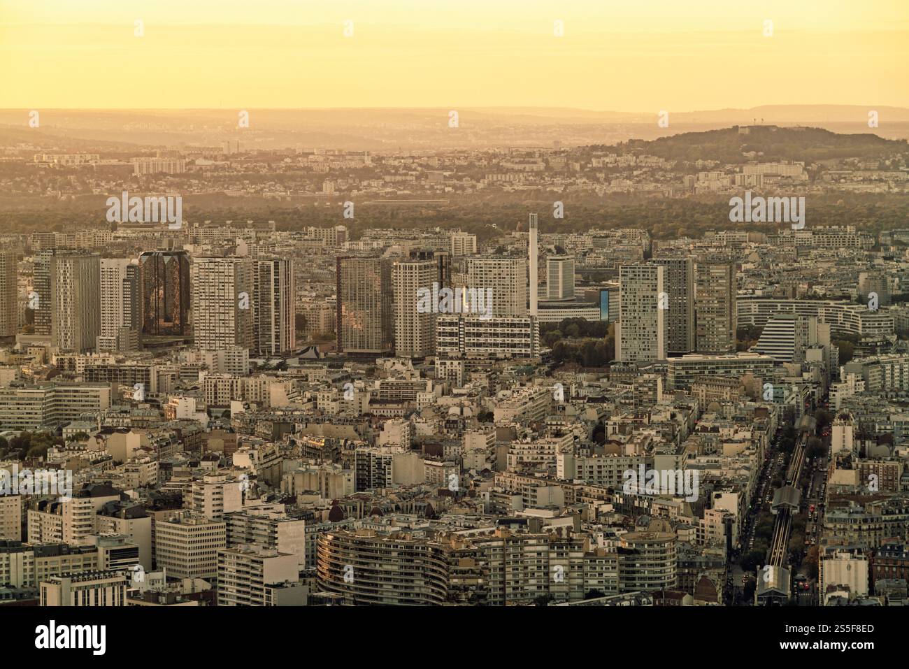 Golden sunlight Aerial view of of Paris with modern buildings and ...