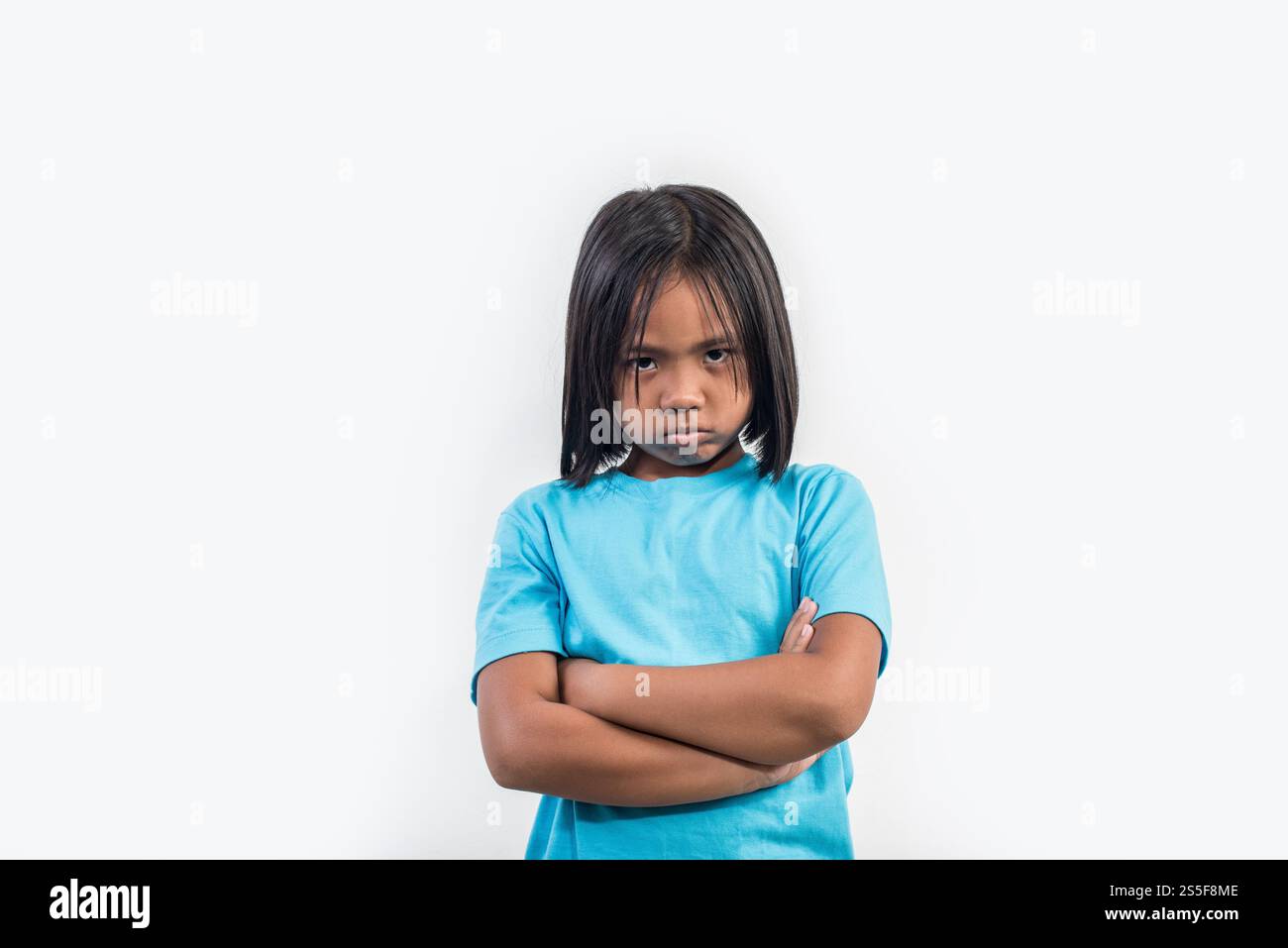 little girl feel angry in studio shot Stock Photo - Alamy