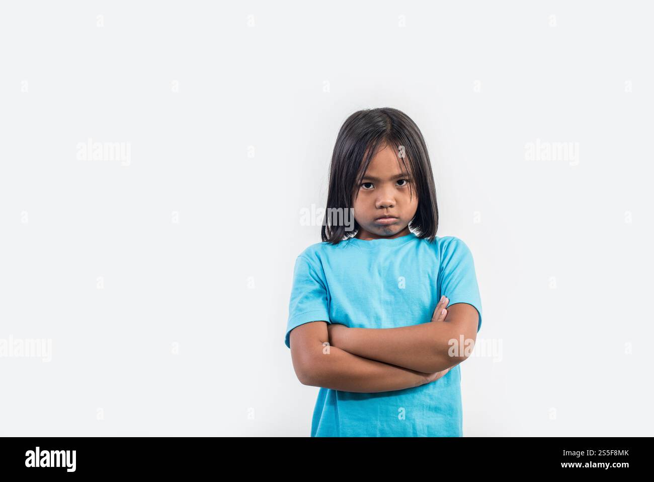 little girl feel angry in studio shot Stock Photo - Alamy