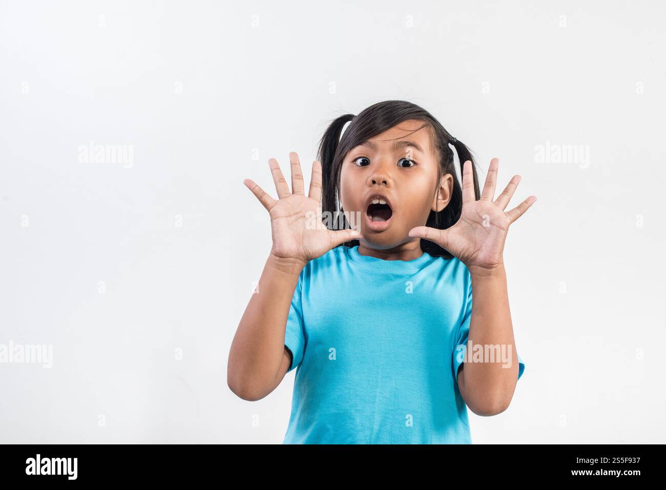 little girl acting Shout in studio shot Stock Photo - Alamy