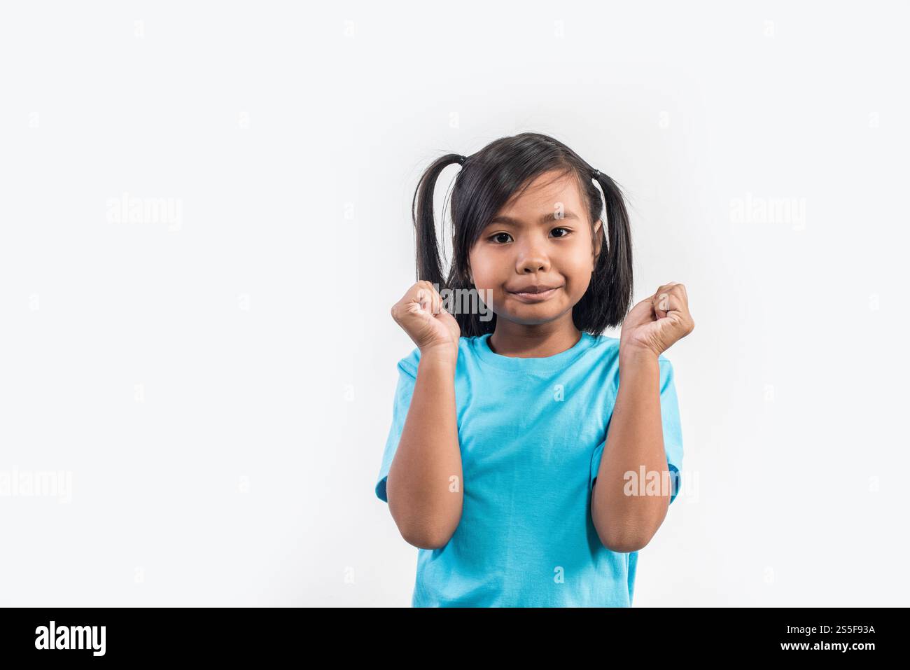 little girl feel angry in studio shot Stock Photo - Alamy