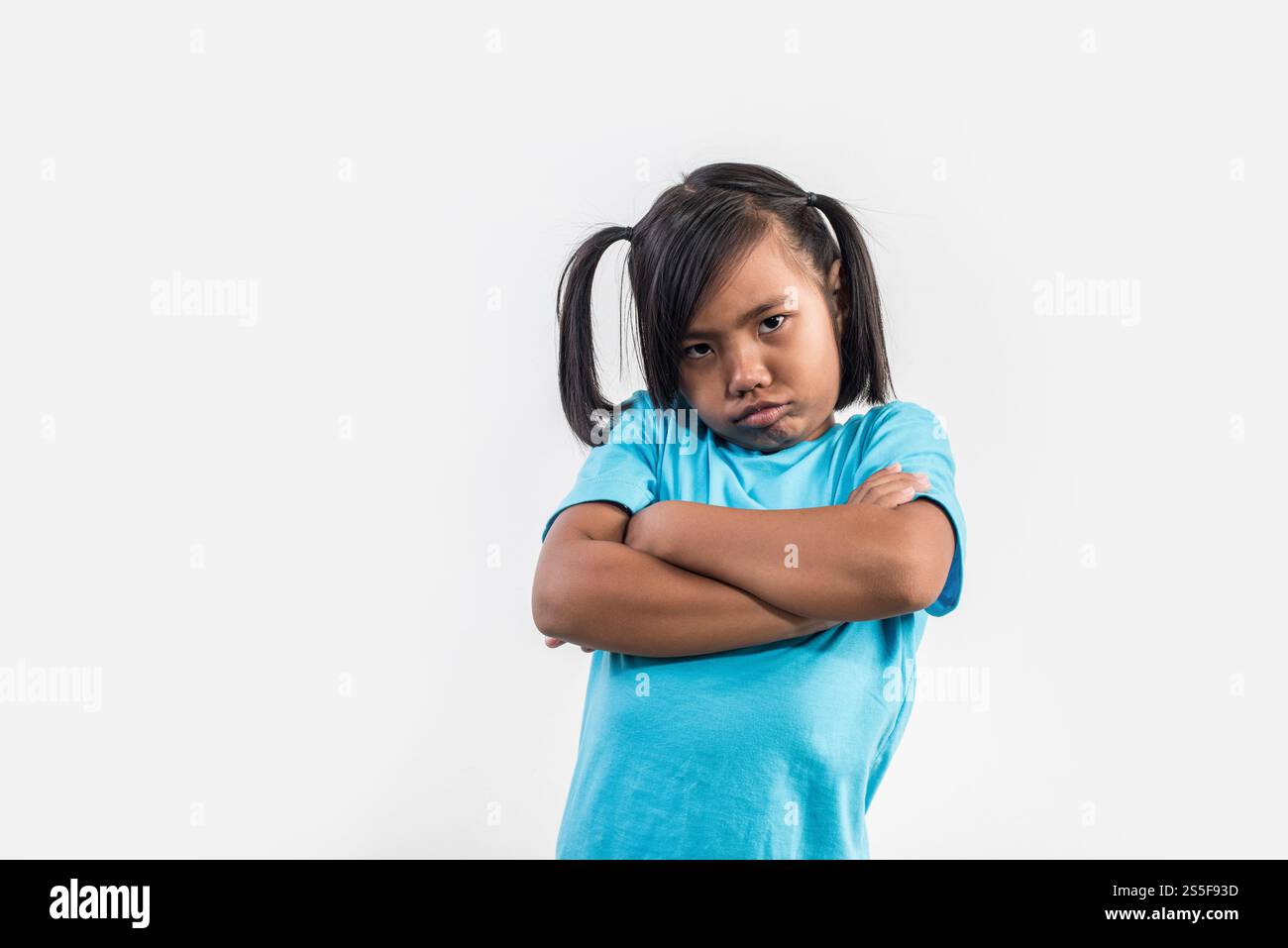 little girl feel angry in studio shot Stock Photo - Alamy