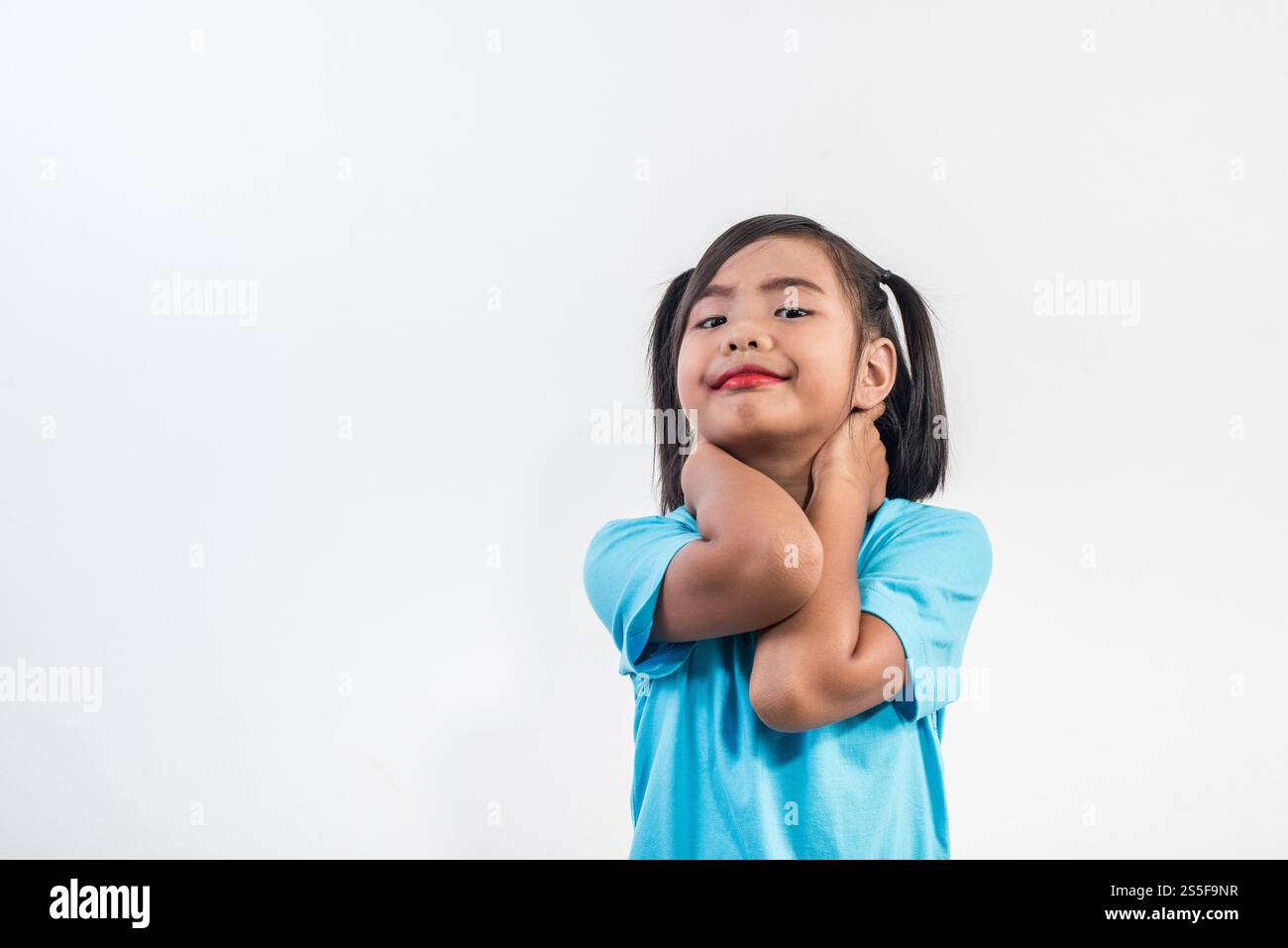 Portrait of Funny little girl acting in studio shot Stock Photo - Alamy