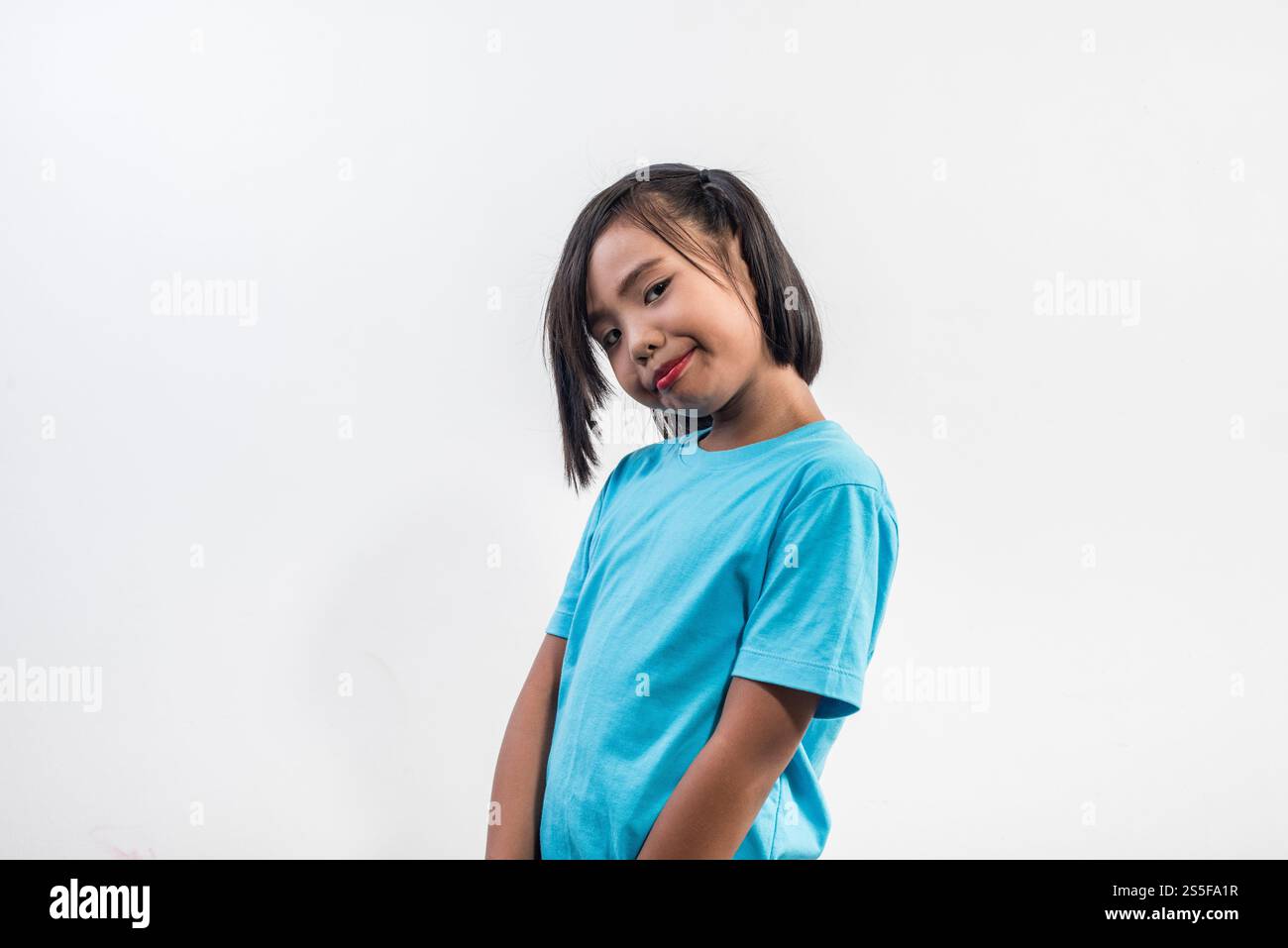 Portrait of Funny little girl acting in studio shot Stock Photo - Alamy