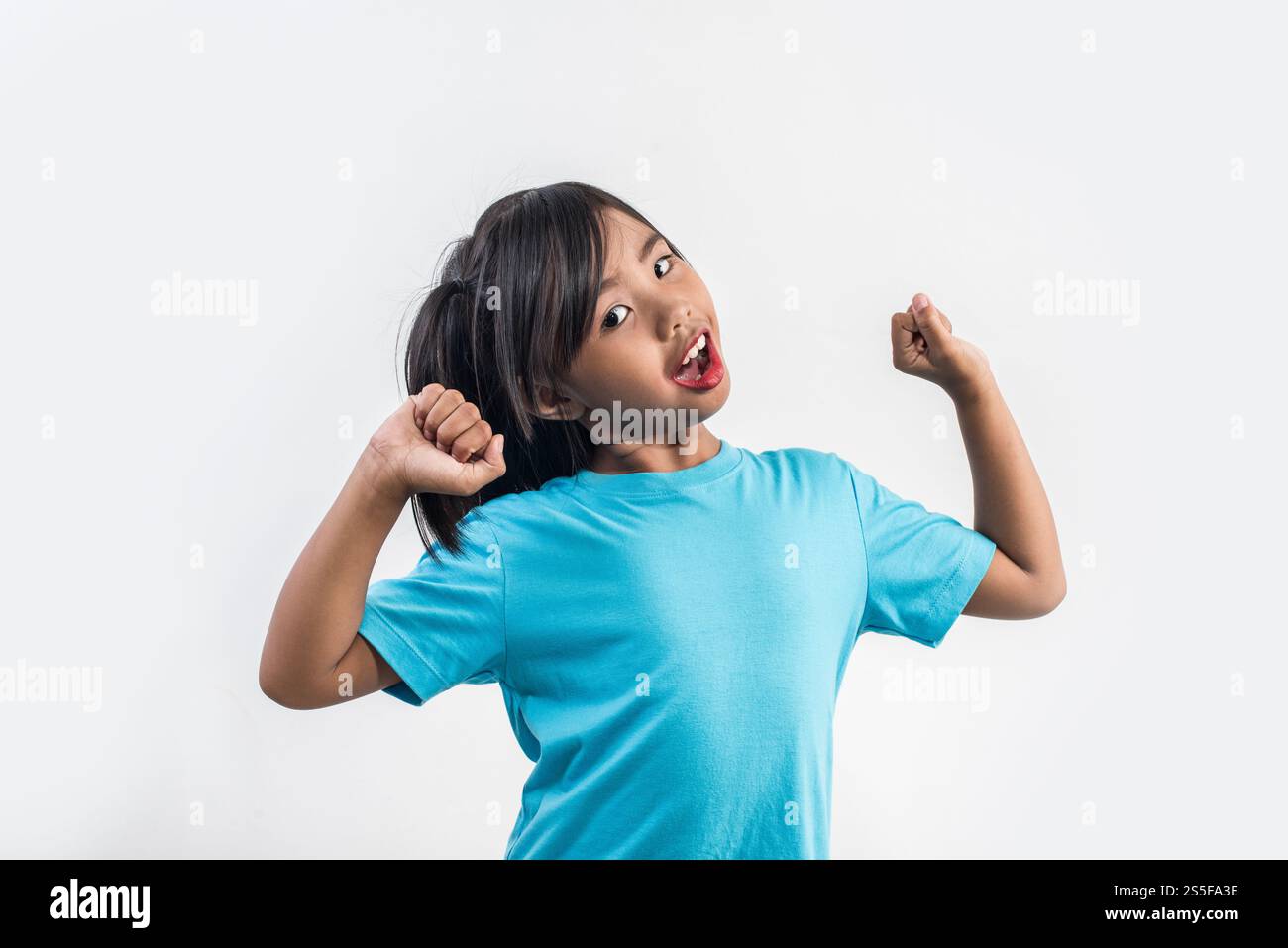 Portrait of Funny little girl acting in studio shot Stock Photo - Alamy