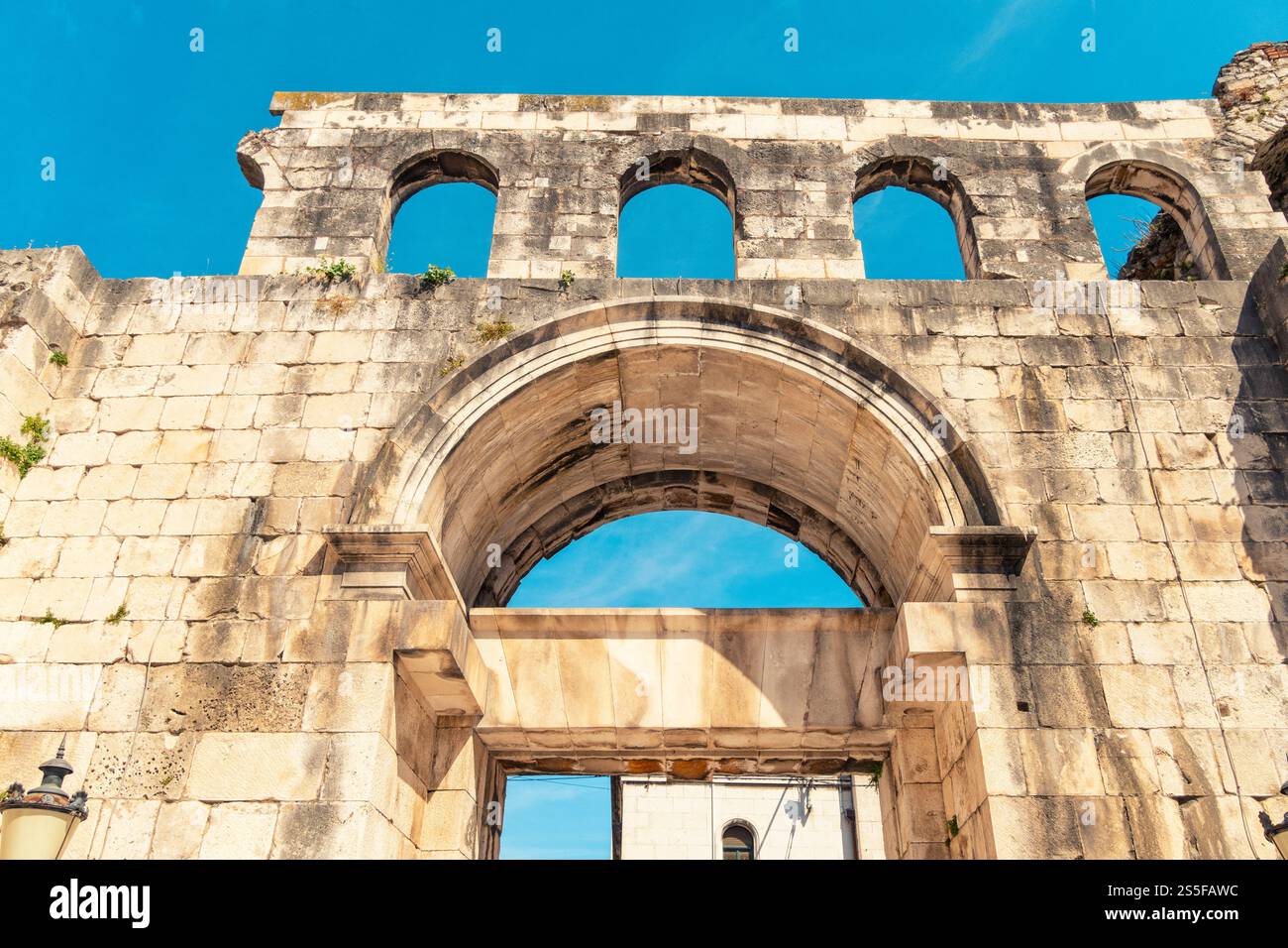 Silver Gate ancient stone archway under a clear blue sky with visible ...