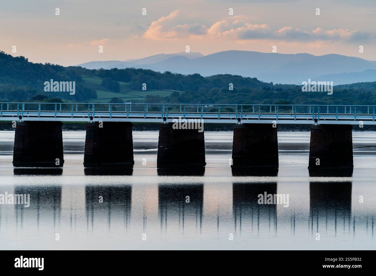 West coast rail line crossing the estuary of the River Kent seen from ...