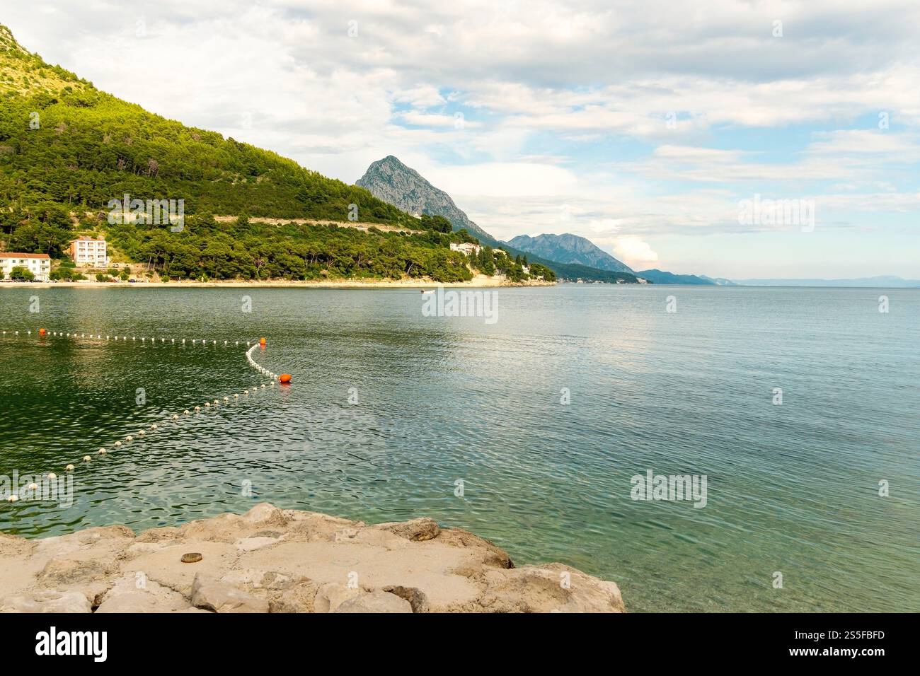 Coastal landscape showing serene sebuoy line hi-res stock photography ...