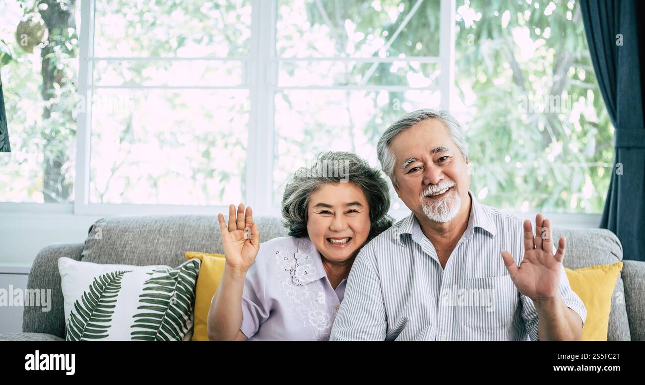 senior couple say Hi look at camera Stock Photo - Alamy