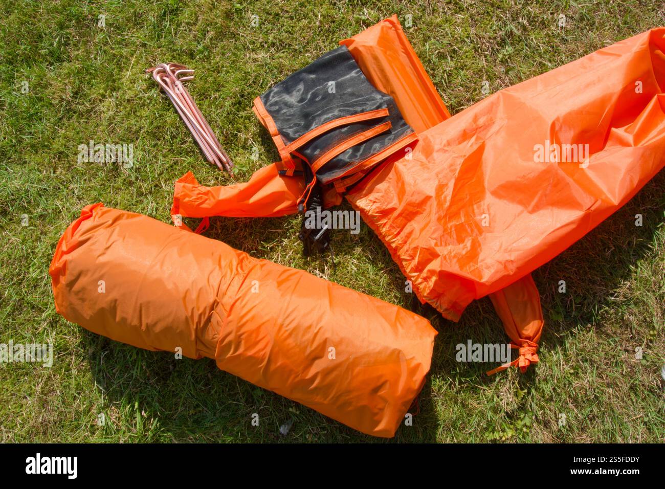 Lightweight tent components ready to pitch Stock Photo - Alamy