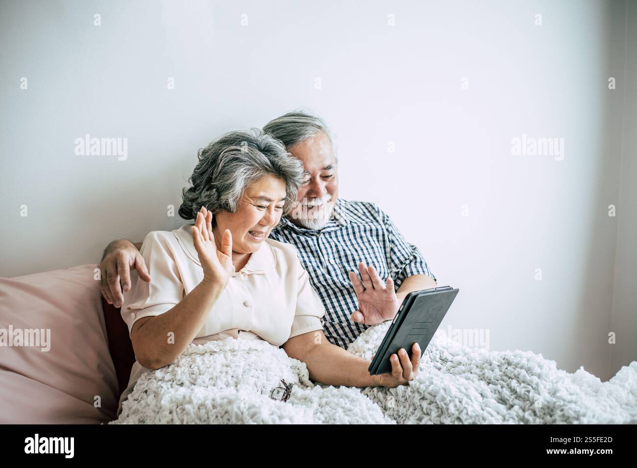 Modern elderly people using tablet hi-res stock photography and images ...