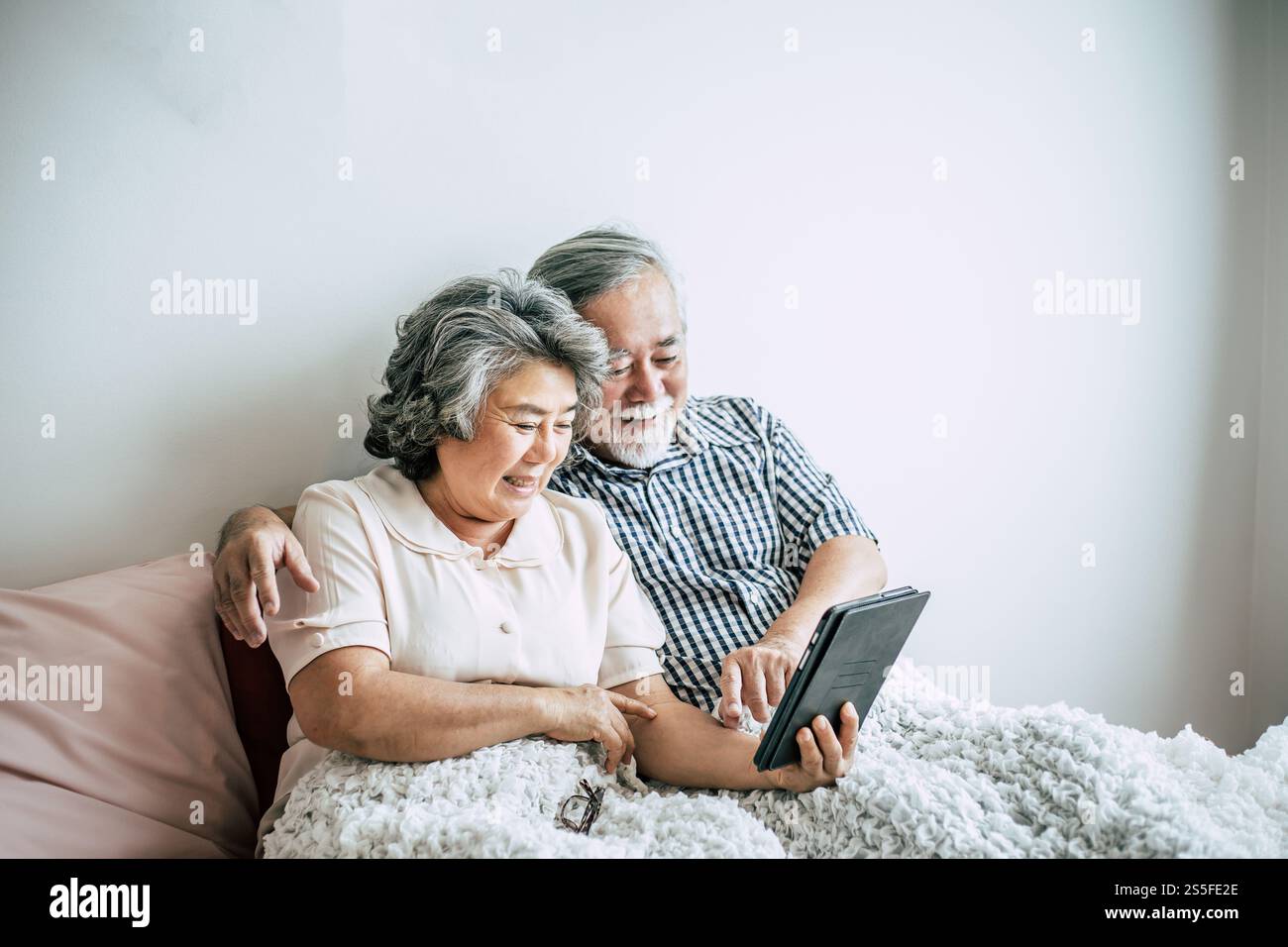 Modern elderly people using tablet hi-res stock photography and images ...